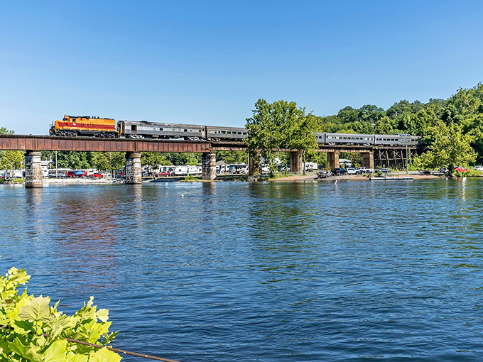 The Branson Scenic Railway crosses a stunning trestle over sparkling waters, offering passengers views inaccessible by car.