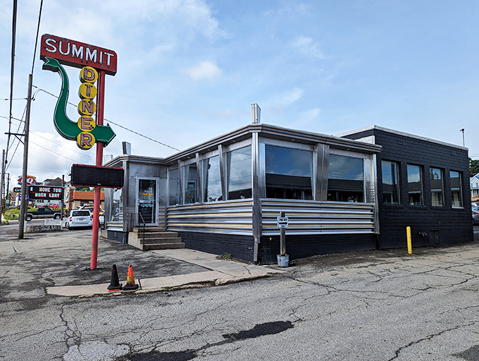 The iconic Summit Diner sign stands tall against the Pennsylvania sky, a neon beacon calling hungry travelers home like a culinary lighthouse.