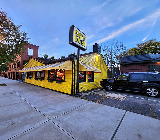 That sunshine-yellow exterior isn't just a building—it's a breakfast beacon calling to hungry souls across Richmond like a carb-loaded lighthouse. Photo credit: Jeanne Hasty