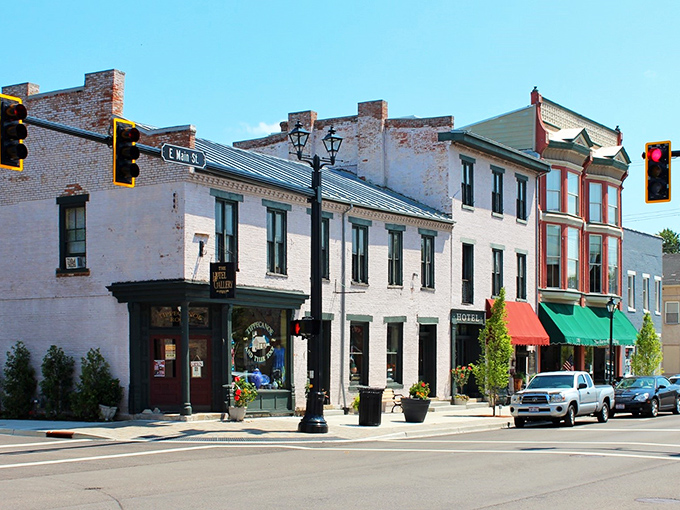 Historic brick buildings line Main Street in Tipp City, where time slows down and window shopping becomes an afternoon adventure worth savoring.