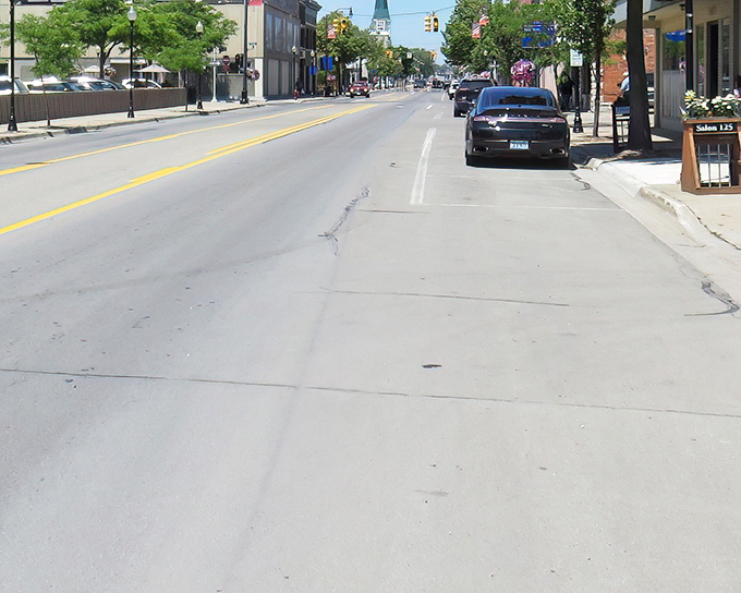 Downtown Alpena on a quiet summer day, where the traffic jams consist of three cars and everyone knows the backstory of each one.