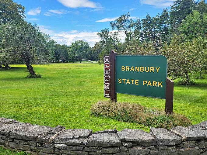 That classic green park sign welcomes you to one of Vermont's most beautifully kept secrets along Lake Dunmore's pristine shores.