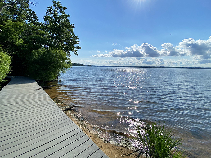 Where land meets water, this wooden walkway invites you to venture just far enough from shore to feel the magic without getting your shoes wet.