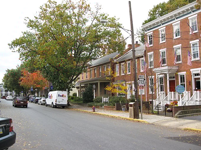 Historic red brick buildings line Manheim's Main Street, where time seems to slow down and modern life takes a backseat to small-town charm.