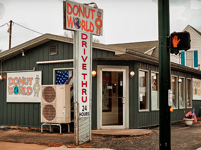 The unassuming exterior of Donut World stands like a beacon of sugary hope in Lancaster, promising 24-hour access to fried dough paradise.