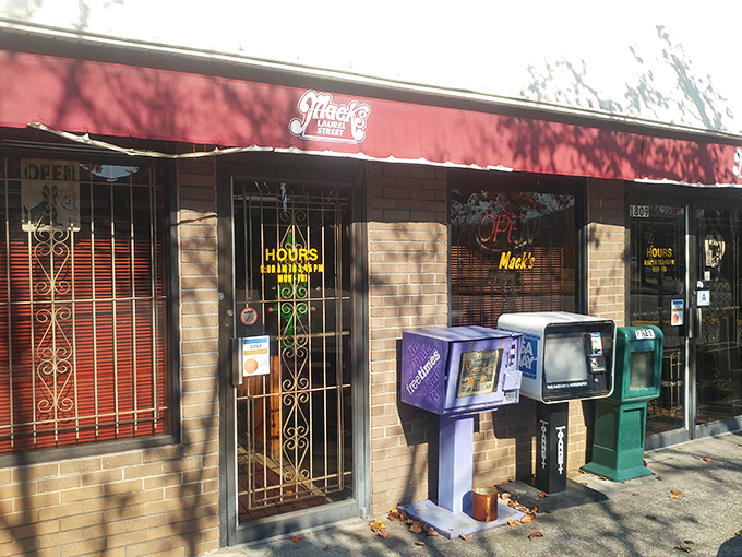 The unassuming brick fa&ccedil;ade of Mack's Cash Grocery stands as Columbia's culinary time machine, complete with vintage newspaper boxes that have witnessed decades of burger-seeking pilgrims.