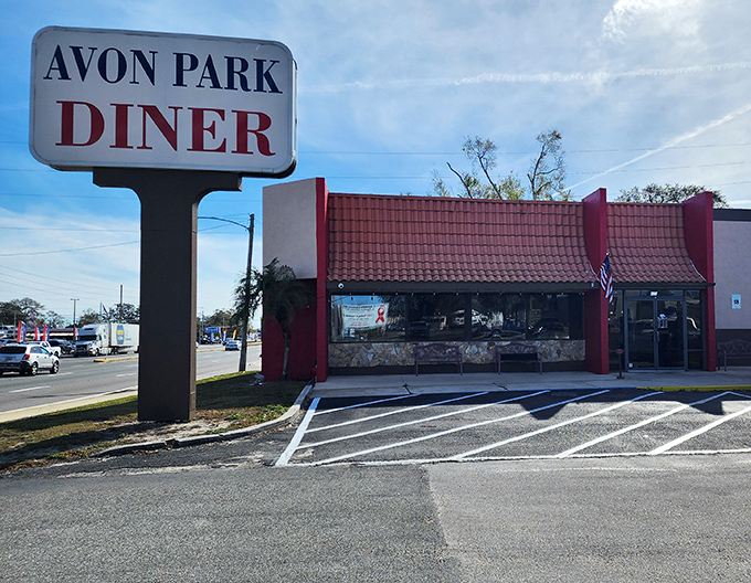 The red-roofed beacon of breakfast hope stands proudly against the Florida sky, promising morning salvation one omelet at a time.