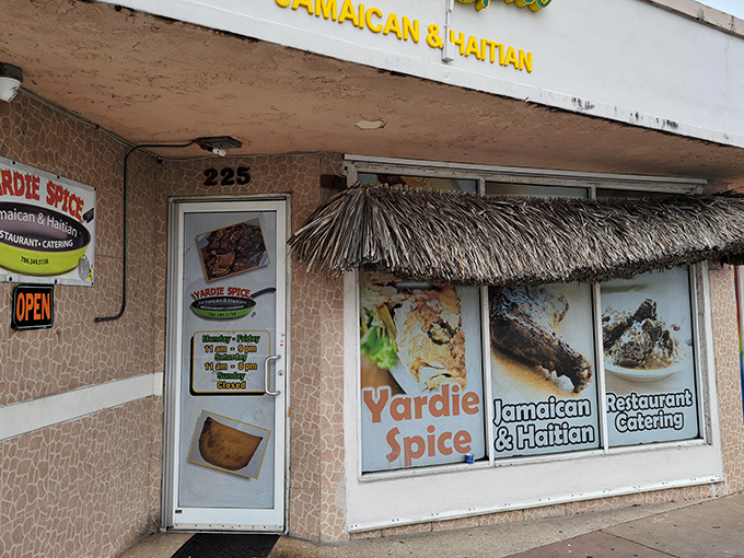 That thatched awning and colorful signage prove you don't need fancy to serve phenomenal Caribbean cuisine.