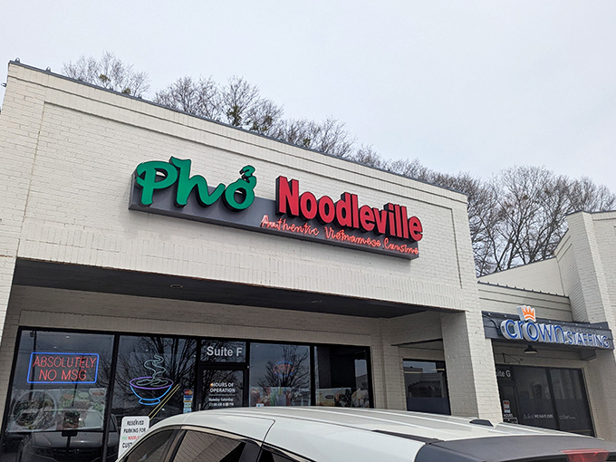 That playful green and red signage beckoning you from the strip mall is your first hint that flavor awaits inside.