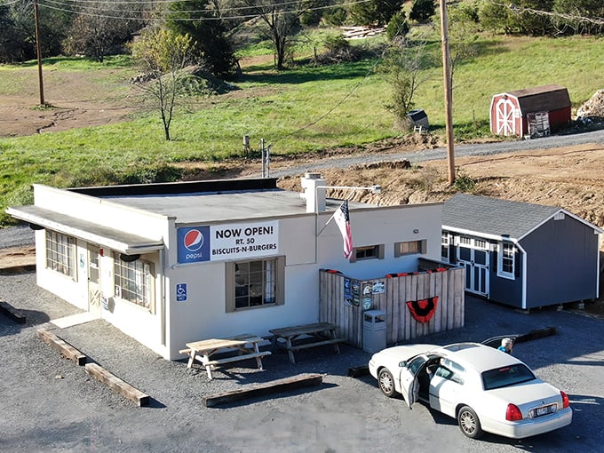 The unassuming exterior of Rt. 50 Biscuits & Burgers stands like a beacon of hope for hungry travelers. No fancy frills, just the promise of honest-to-goodness comfort food.