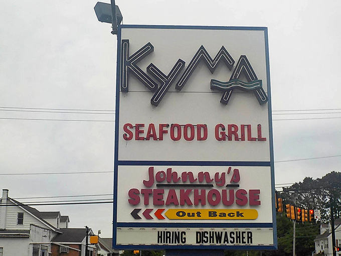 The iconic Kyma Seafood Grill sign stands proudly in Stevens, with Johnny's Steakhouse "Out Back" - a two-for-one culinary adventure waiting to happen.