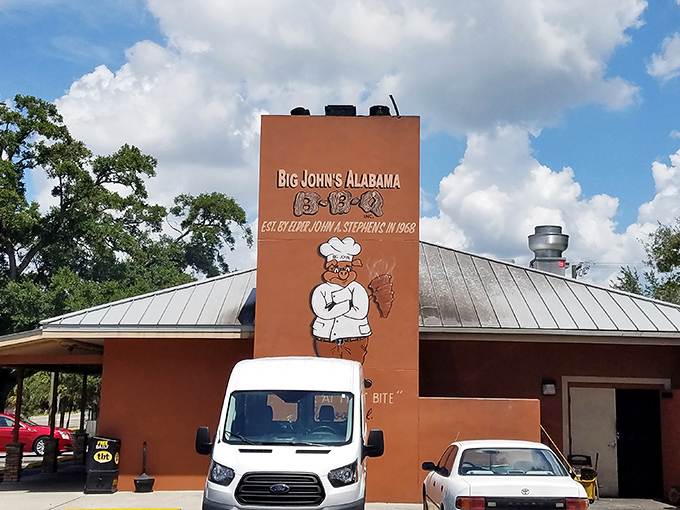 The iconic terracotta-colored exterior with its distinctive chimney and chef mascot announces you've arrived at BBQ heaven. No fancy frills needed.