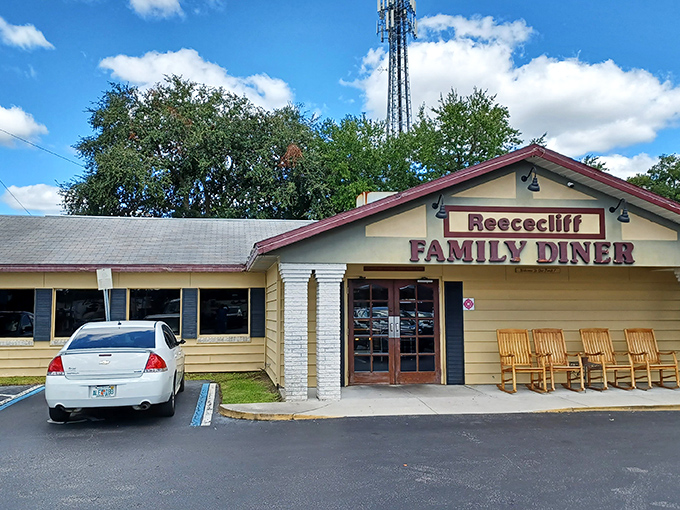 The classic yellow exterior with those inviting rocking chairs says "slow down and stay awhile" before you even walk through the door.