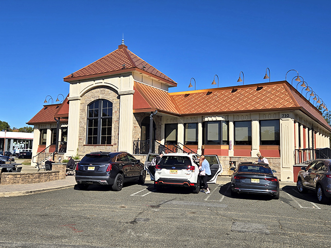 Bathed in golden sunlight, the diner's architectural details shine. Those copper accents aren't just for show&mdash;they're signaling "serious food happens here."