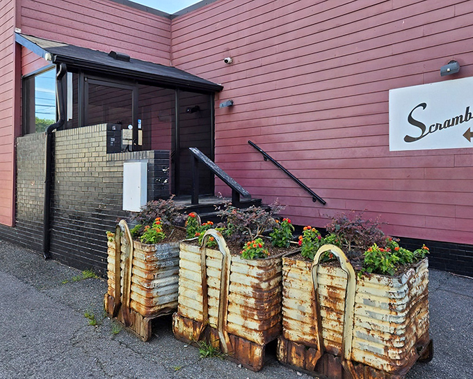 The brick-red exterior of Scrambled Southern Diner beckons like a culinary lighthouse, promising breakfast salvation to hungry Greensboro travelers.