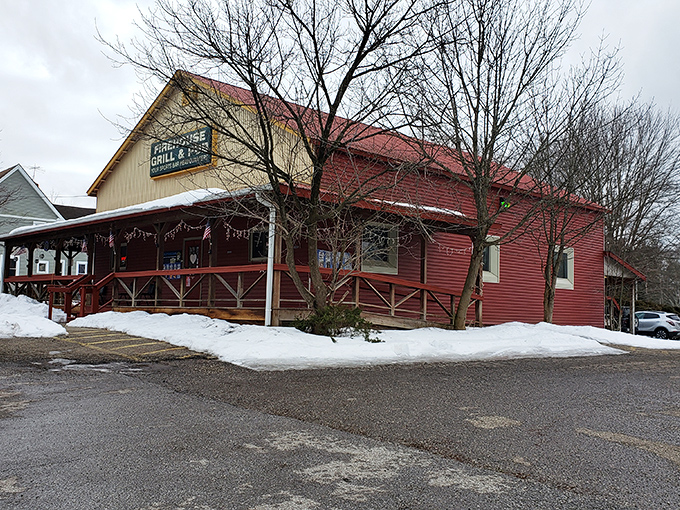 The red exterior of Rootstown Firehouse Grille & Pub stands ready to welcome hungry visitors, like a culinary lighthouse guiding flavor-seekers through Ravenna's dining landscape.