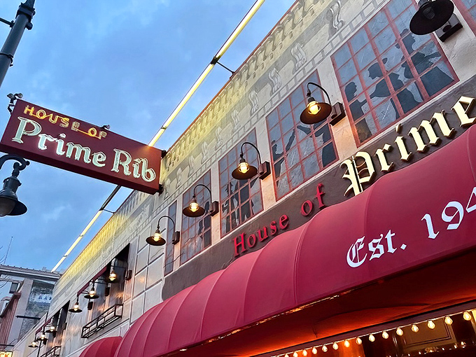 The iconic red awning and vintage sign of House of Prime Rib stand as a beacon to meat lovers on Van Ness Avenue. A San Francisco institution since 1949.