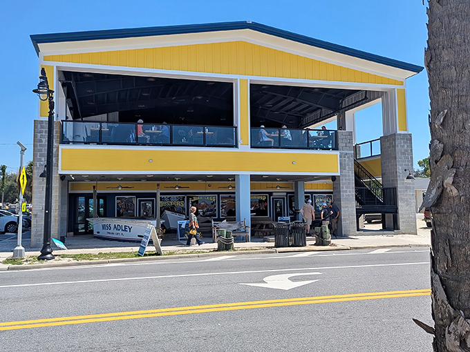 The sunshine-yellow exterior of Hunt's isn't just a building—it's a beacon calling seafood lovers home to Panama City's beloved institution.