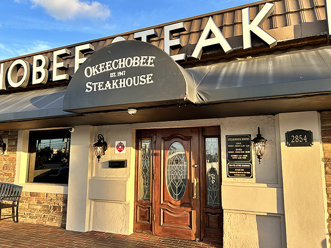 The unassuming exterior of Okeechobee Steakhouse belies the carnivorous paradise within. Like finding a treasure chest disguised as a mailbox, this 1947 landmark promises beef-filled bliss. 