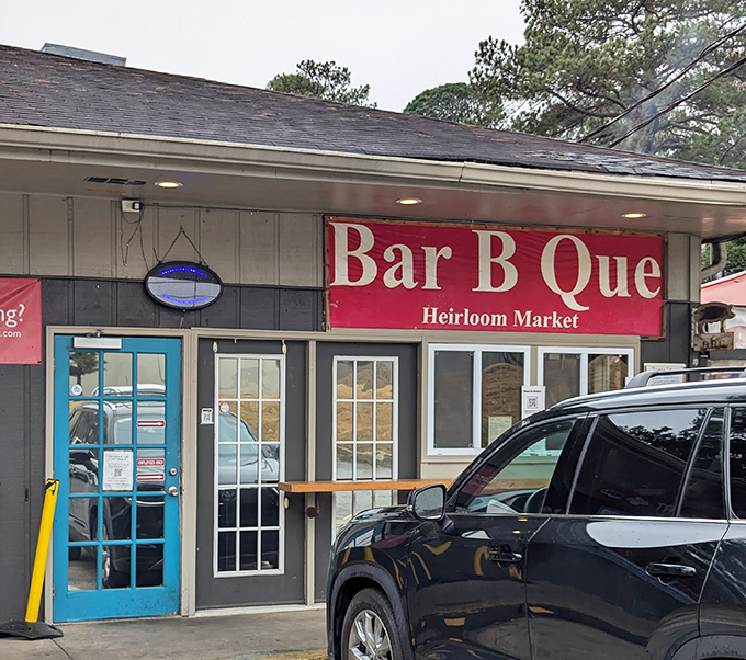 The unassuming exterior of Heirloom Market BBQ proves once again that culinary greatness often hides behind the most modest facades. No frills, just thrills awaiting inside.
