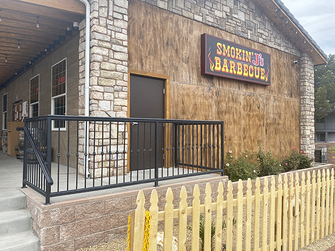 The unassuming exterior of Smokin' J's Barbecue proves once again that the best food often hides behind the most modest facades. Desert barbecue paradise awaits.