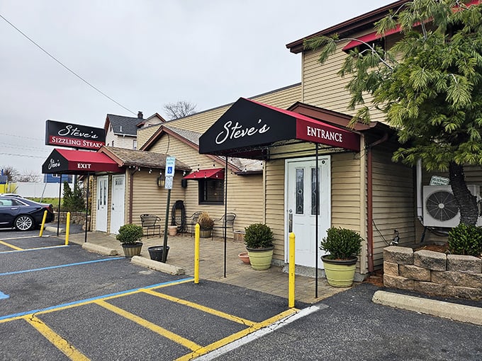 The unassuming exterior of Steve's Sizzling Steaks proves once again that the best culinary treasures often hide behind the most modest facades.