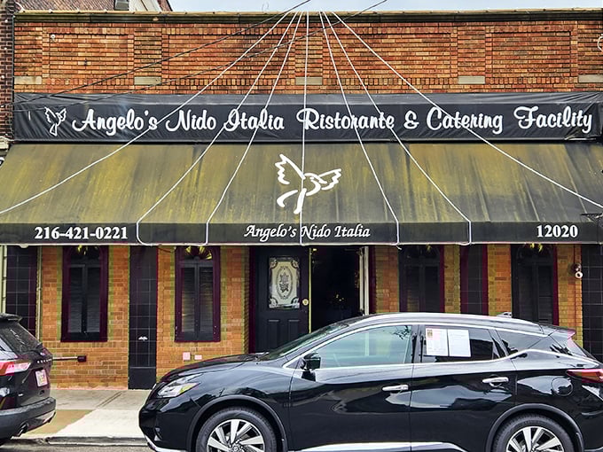 The unassuming brick facade of Angelo's Nido Italia beckons like an old friend, promising Italian comfort beneath its classic awning.