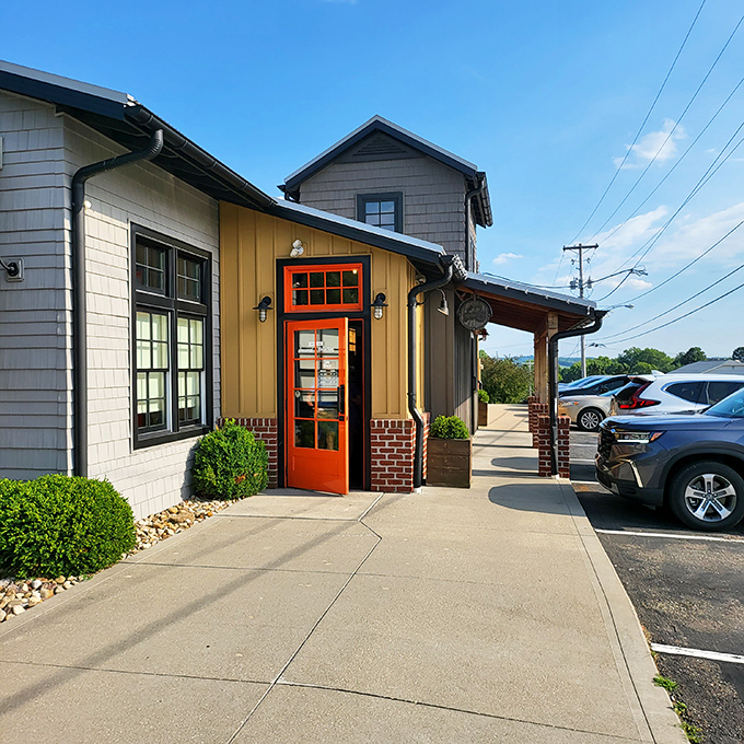 The bright orange door isn't just an entrance&mdash;it's a portal to flavor country, beckoning hungry travelers with its cheerful promise.