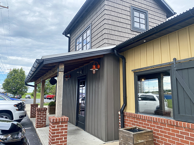 The charming farmhouse-inspired exterior of Park Street Pizza beckons like an old friend with a delicious secret to share.