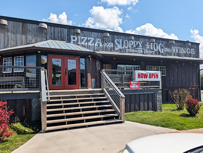 The rustic charm of Sloppy Hog's exterior isn't trying to impress anyone, which is exactly why it impresses everyone. Mountain views included at no extra charge.