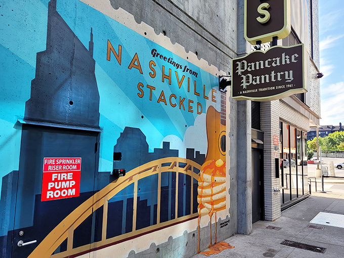 "Greetings from Nashville Stacked" &ndash; this colorful mural welcomes hungry visitors with a taste of Music City's artistic spirit.