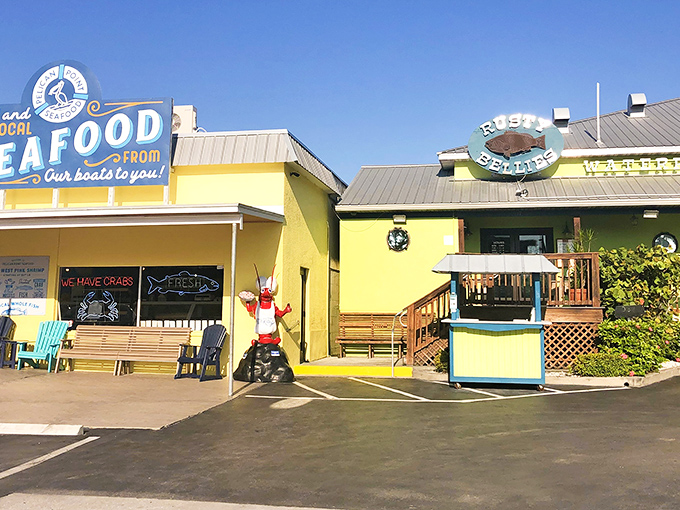 Where seafood dreams come true! The cheerful yellow and green buildings house treasures from the deep, just steps from the boats.
