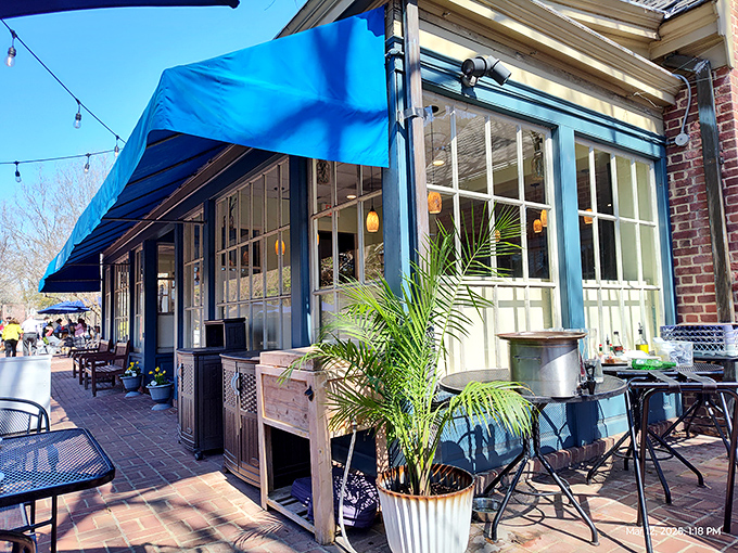 The iconic blue awning of Berret's stands out like a maritime flag, beckoning seafood lovers to drop anchor at this Williamsburg gem.