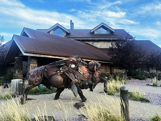 The iconic metal bison sculpture welcomes hungry visitors to Dakotah Steakhouse, setting the tone for a true South Dakota dining adventure.