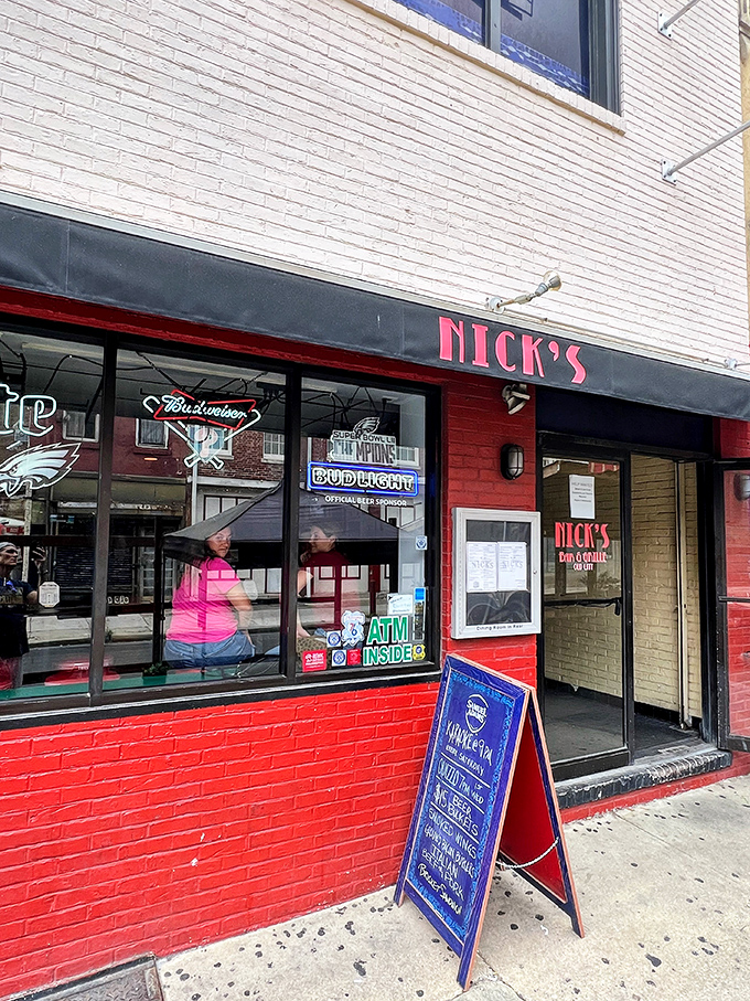 The red brick exterior of Nick's beckons like an old friend, promising comfort food and cold drinks behind that unassuming fa&ccedil;ade.