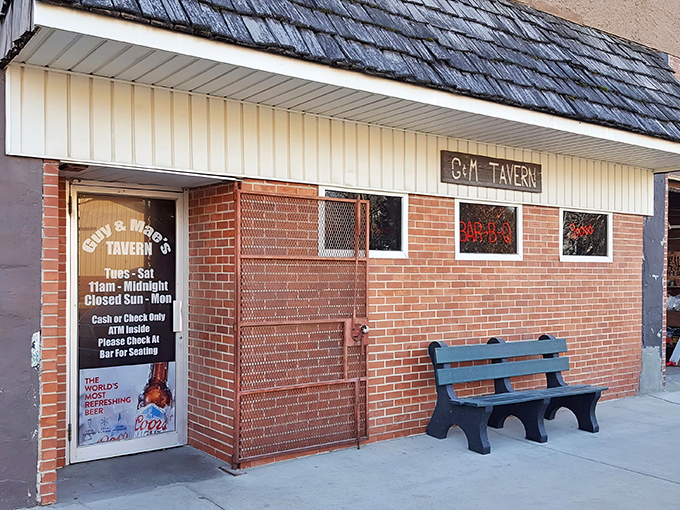 The unassuming exterior of Guy & Mae's Tavern hides culinary treasures that would make barbecue royalty bow down. Small-town magic at its finest.