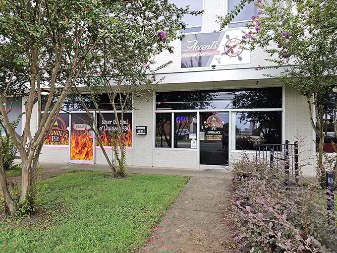 The unassuming storefront might fool you, but those flame decals aren't lying&mdash;serious barbecue magic happens behind these doors.