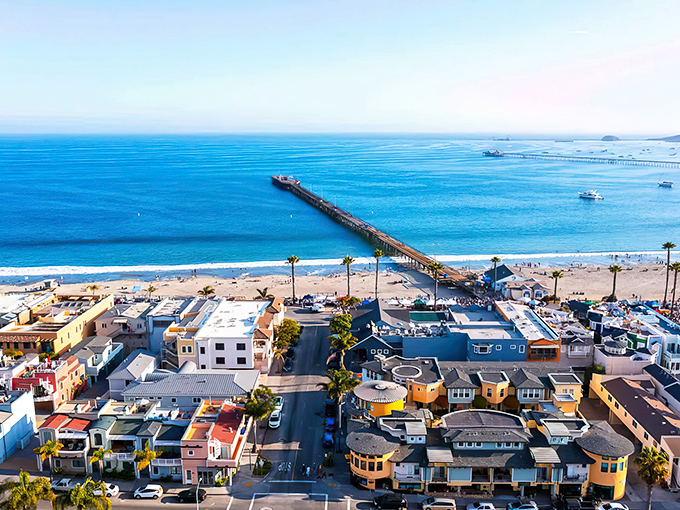 Aerial dreams come true! Avila Beach unfolds like a perfect postcard with its iconic pier stretching into the impossibly blue Pacific waters.