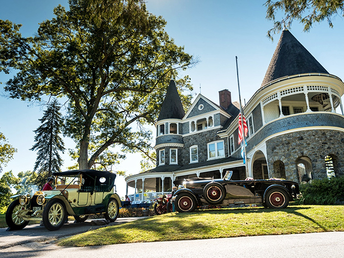 The majestic Auburn Heights mansion stands like a Victorian time capsule, with vintage automobiles parked out front as if waiting for their Gatsby-era owners to return.