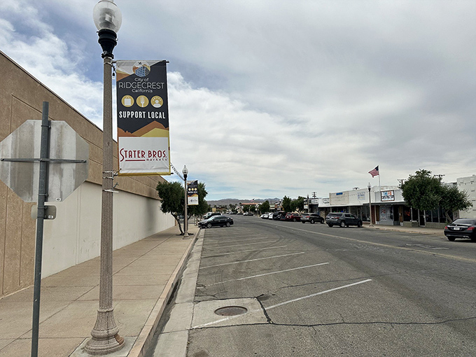 Downtown Ridgecrest welcomes you with its "Support Local" banner &ndash; small-town charm with big desert skies overhead.