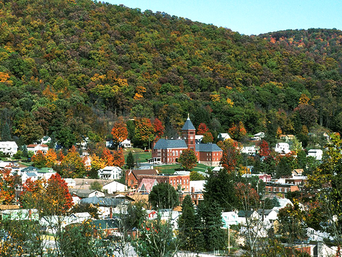 Autumn transforms Emporium into nature's masterpiece, with the historic courthouse standing proud amid a tapestry of fall colors.