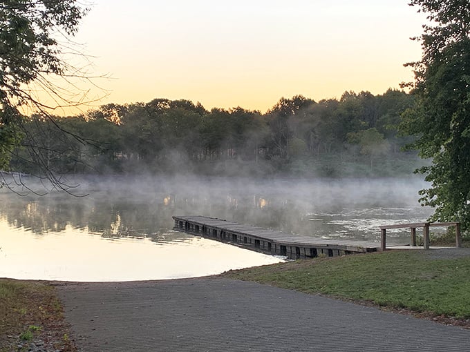 Morning mist hovers like nature's special effect over the glassy waters, with that wooden pier practically begging you to enjoy a moment of Thoreau-worthy contemplation.