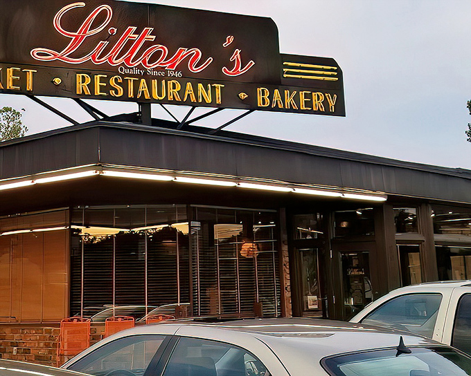 The iconic Litton's sign glows like a beacon for burger pilgrims, promising three essential food groups: market, restaurant, and bakery.