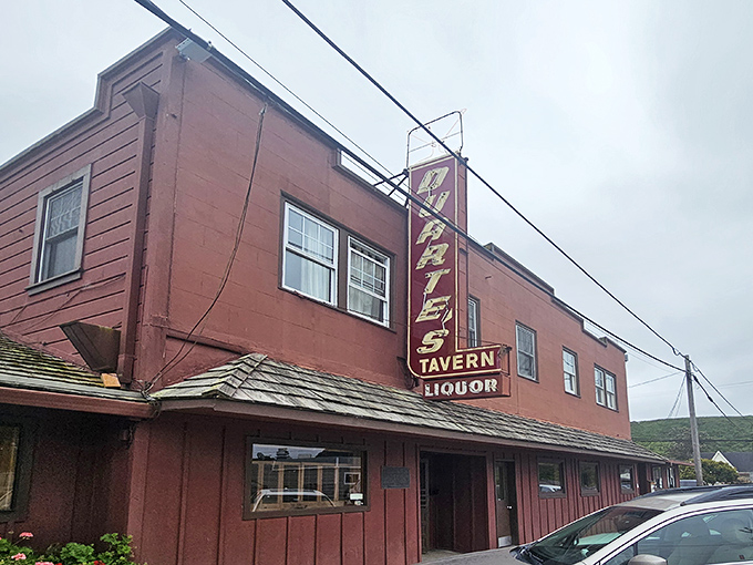 The brick-red exterior of Duarte's Tavern stands like a culinary lighthouse on Pescadero's main drag, beckoning hungry travelers with its vintage neon sign.