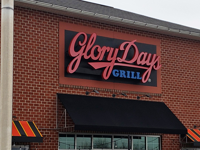 The brick facade and bold signage of Glory Days Grill promises what every sports fan secretly craves: good food without the pretension.