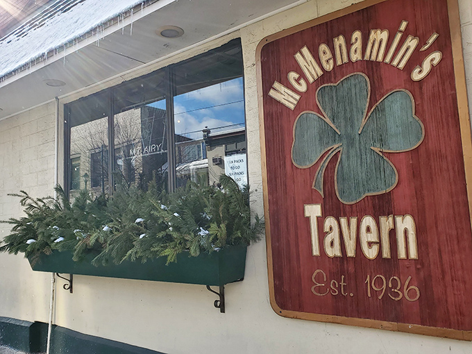 The iconic shamrock sign welcomes you to McMenamin's Tavern, where Irish hospitality has been warming Philadelphia hearts since 1936.