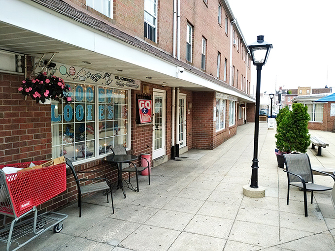The unassuming brick storefront of Gooey Looies stands like a sandwich sanctuary in South Philly, complete with sidewalk seating for post-hoagie contemplation.