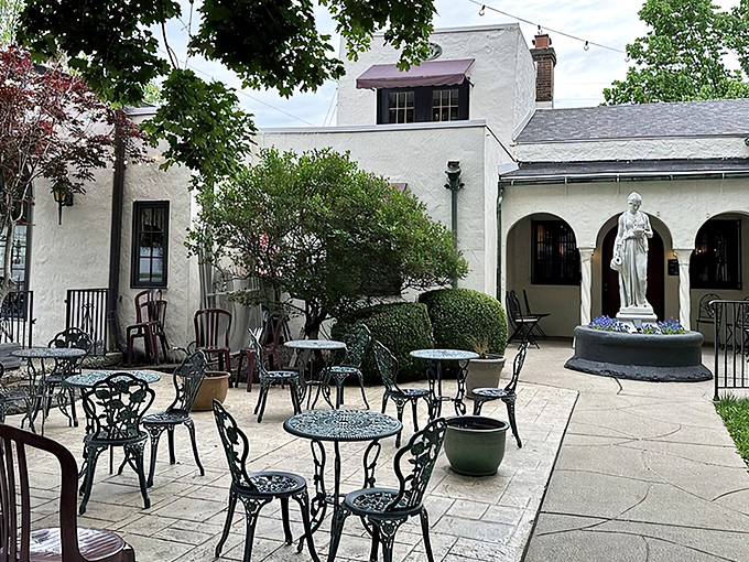 Wrought iron tables dot the courtyard, creating a Mediterranean escape in Indianapolis where you'd half expect to see Italian nonnas gossiping nearby.