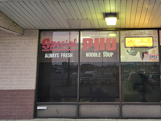 The window proudly announces "Special PHO - ALWAYS FRESH" like a delicious promise to passersby. No false advertising here&mdash;just honest-to-goodness Vietnamese goodness.
