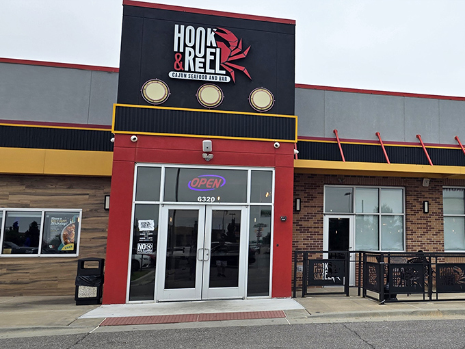 No pretension here&mdash;just a welcoming storefront that promises Cajun treasures within. The red trim hints at the spicy delights awaiting.